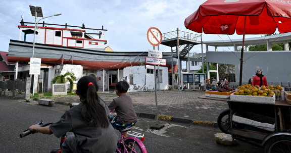 ‘We still carry the tsunami with us’: Aceh thrives 20 years after ...
